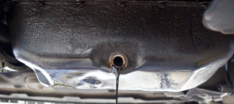 Why Is My Car Leaking Oil? Common Causes (& How To Fix It)